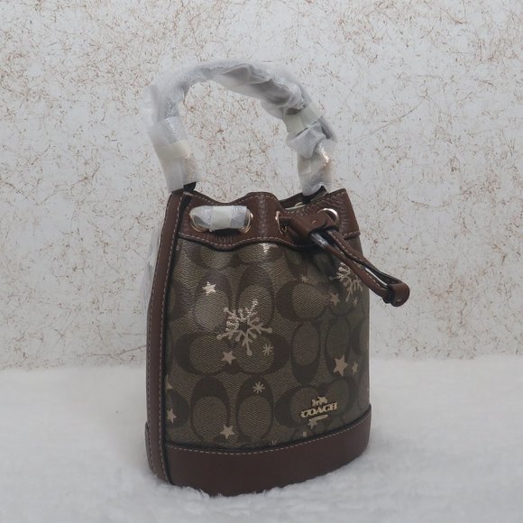 Coach | Bags | Coach Dempsey Star Snowflake Print Drawstring Bucket Bag ...